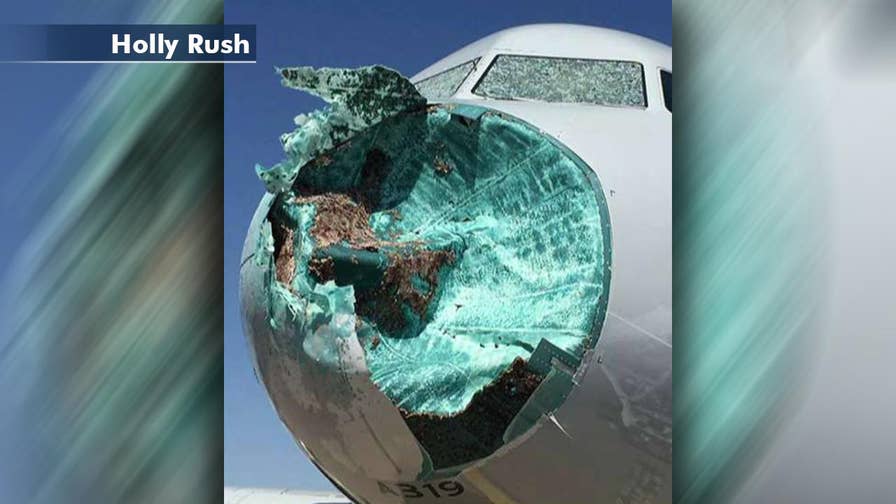 Photos show damage to American Airlines plane from hail storm following ... Photos show damage to American Airlines plane from hail storm following ...
