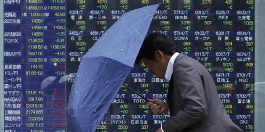 Asian shares mostly higher, Shanghai drops | Fox Business Video