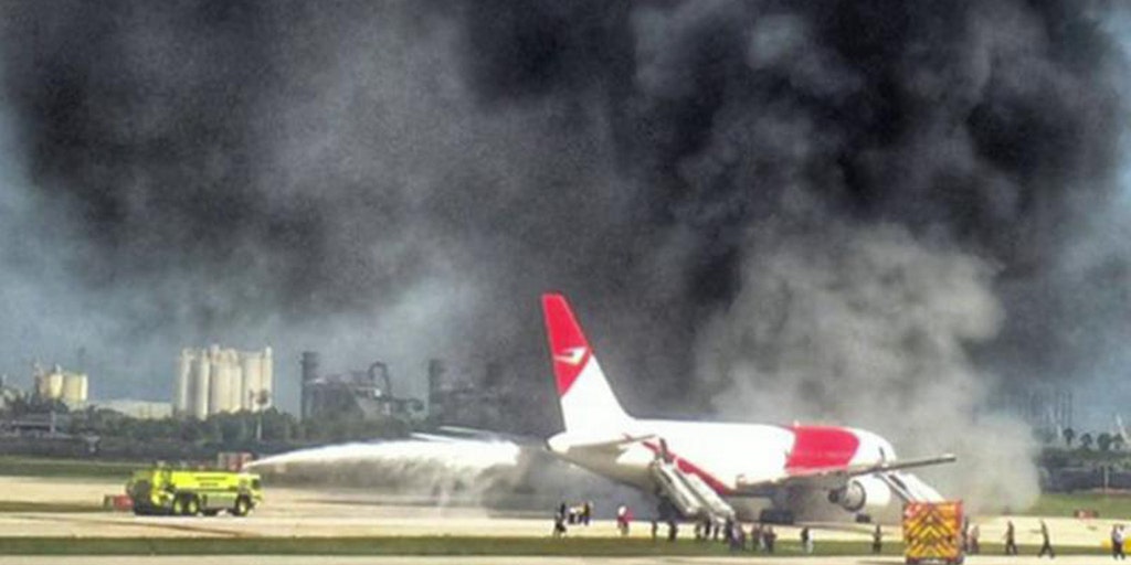 Plane catches fire, burns on runway at Florida airport | Fox News Video