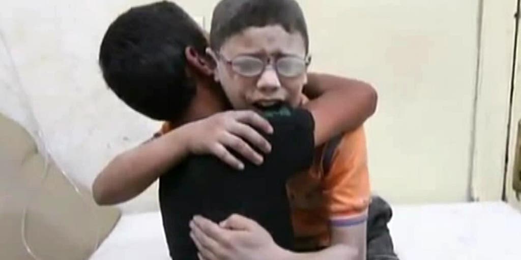 Tragic video of Syrian boys grieving over killed brother | Fox News Video