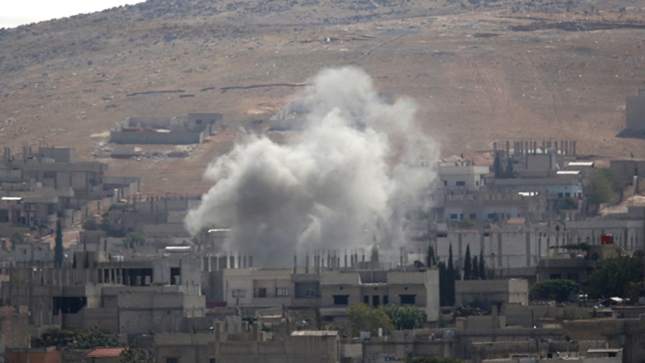 Heavy fighting between Kurdish fighters, ISIS near Syrian border with ...