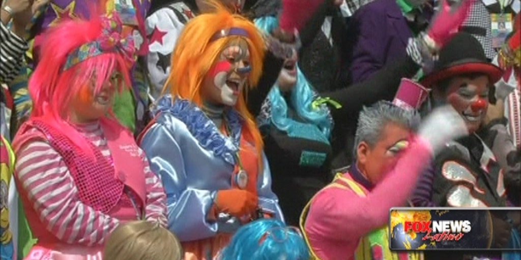 Clowns try to set a new record for laughing | Fox News Video