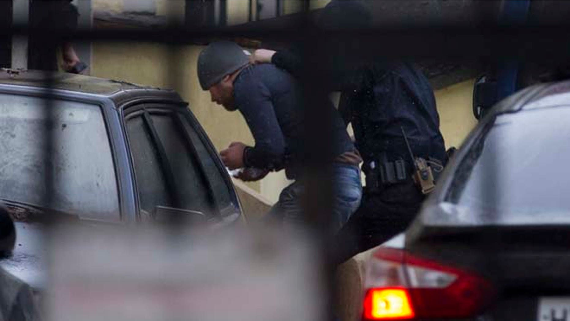 Russian Court Charges 2 Detains 3 Others In Killing Of Putin Critic