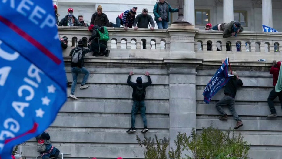 Arkansas man seen beating cop with flagpole during Capitol riot ... Arkansas man seen beating cop with flagpole during Capitol riot ...