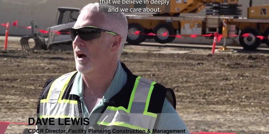 California construction workers tear down wall to make room for ...