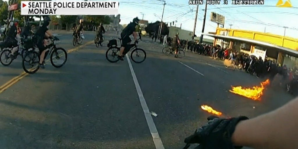 Seattle police form human barricade outside headquarters | Fox News Video