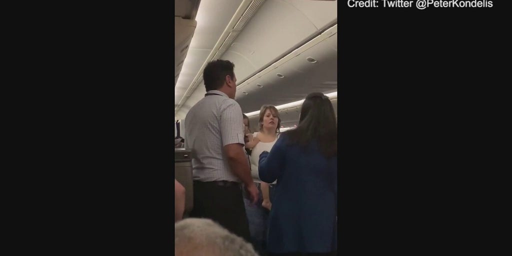 United Airlines flight attendant is taken to hospital following ...
