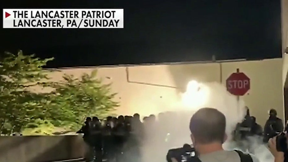 Lancaster Protesters Throw Bricks Break Glass At Police Station After