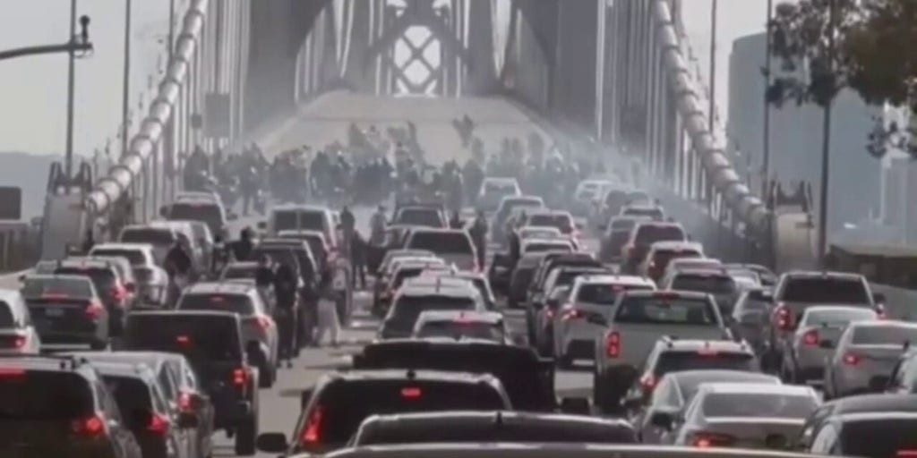 Video shows motorcyclists performing in a chaotic sideshow, stopping ...