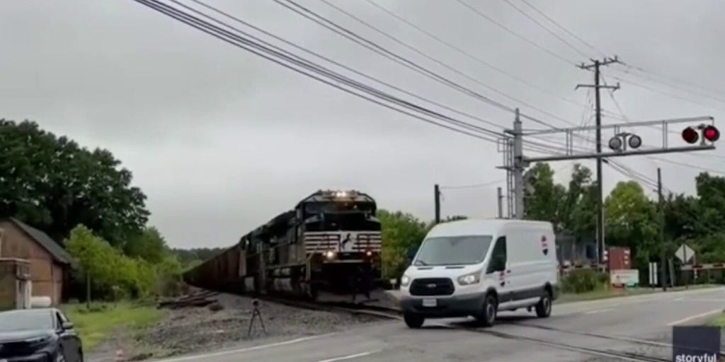Van narrowly avoids being hit by train in Virginia | Fox News Video