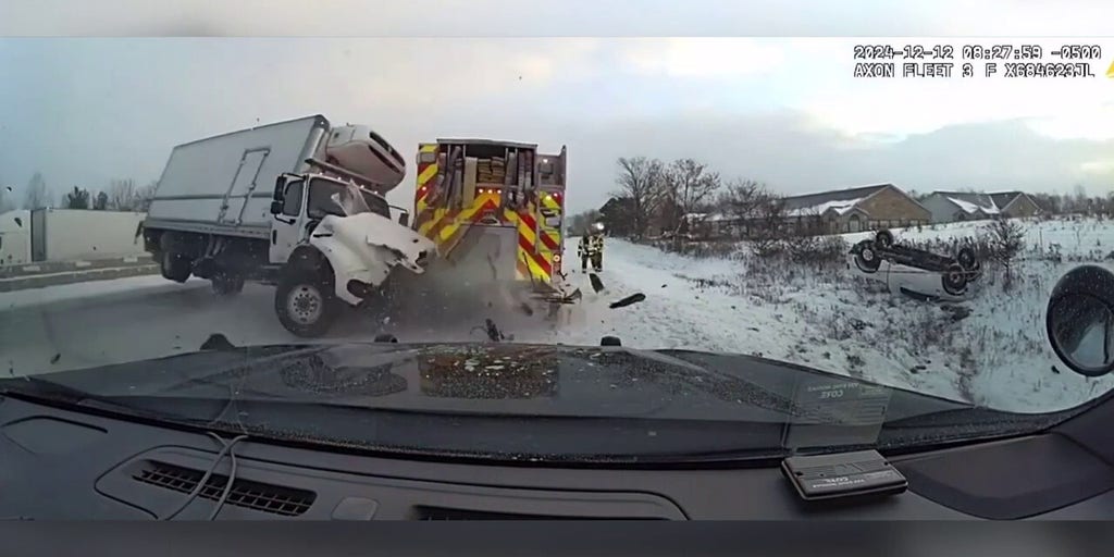 Out-of-control semi-truck jackknifes first responder vehicles on icy ...