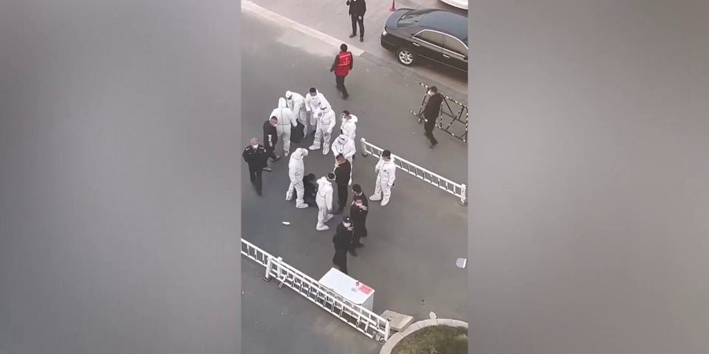 China lockdown enforcers arrested for attacking civilians | Fox News Video