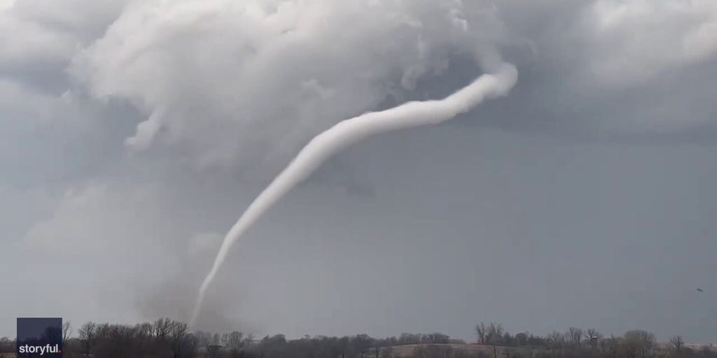 Rope-like tornado spins over Iowa town | Fox News Video