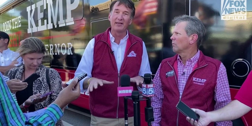 Republican Gov. Glenn Youngkin of Virginia, campaigning with GOP Gov. Brian Kemp of Georgia ...
