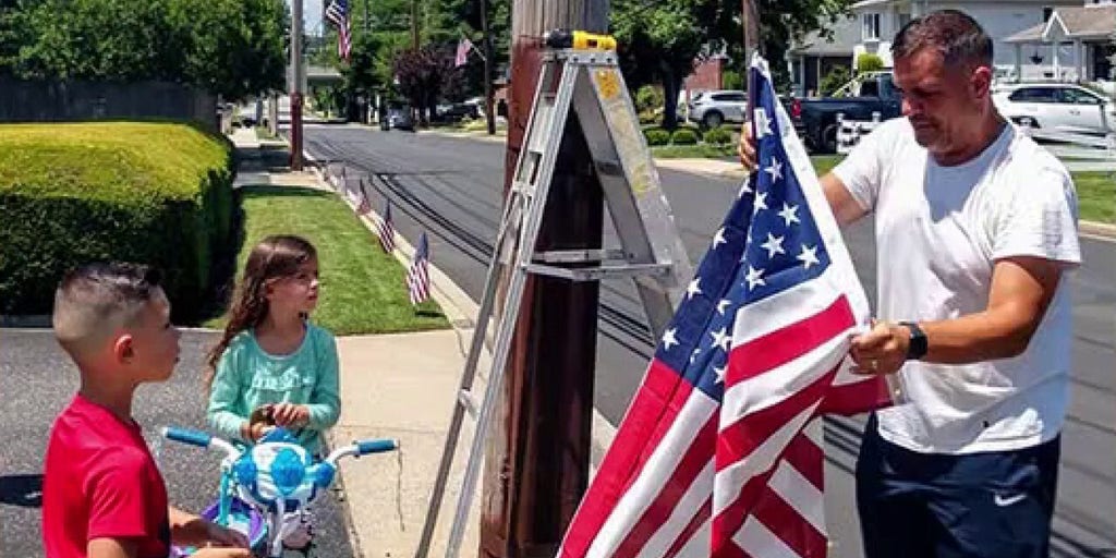 Community raises money to place hundreds of American flags throughout ...