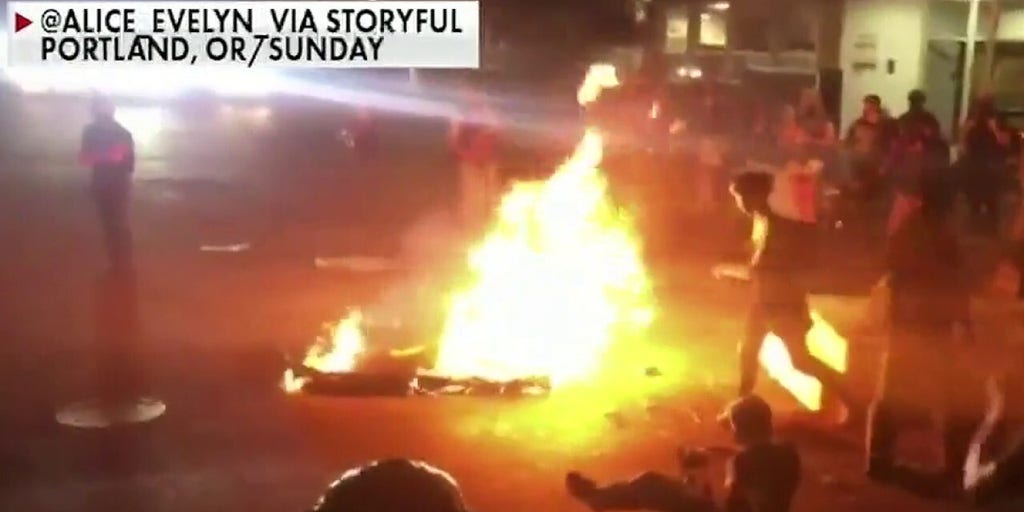 Portland demonstrators gather near police precinct, set fires | Fox ...