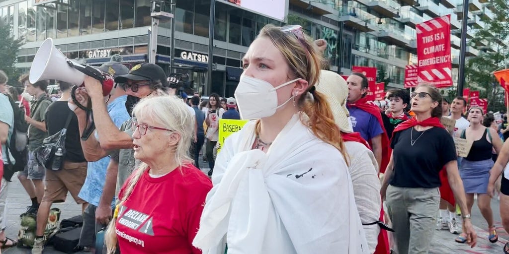 Climate activists demand Biden declare climate emergency while ...