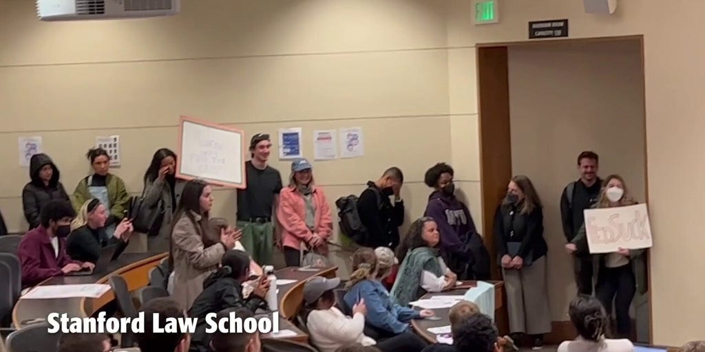 Stanford DEI dean looks on as protesters shout down Trump judge | Fox ...