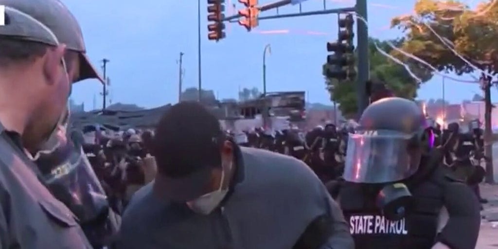 CNN crew arrested at protest | Fox News Video