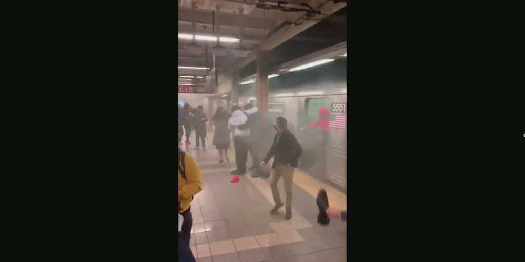 Brooklyn subway passengers hurry out of train after shooting leaves ...
