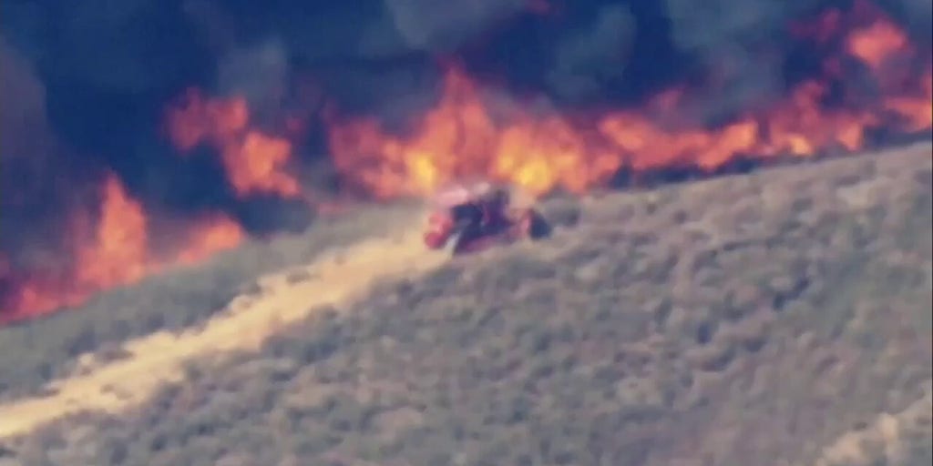 LA County Fire Department bulldozer battles Hughes Fire; residents ...
