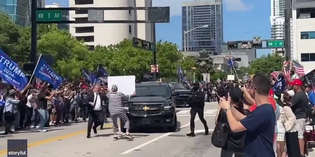 Protestor detained after running in front of Trump's motorcade | Fox ...