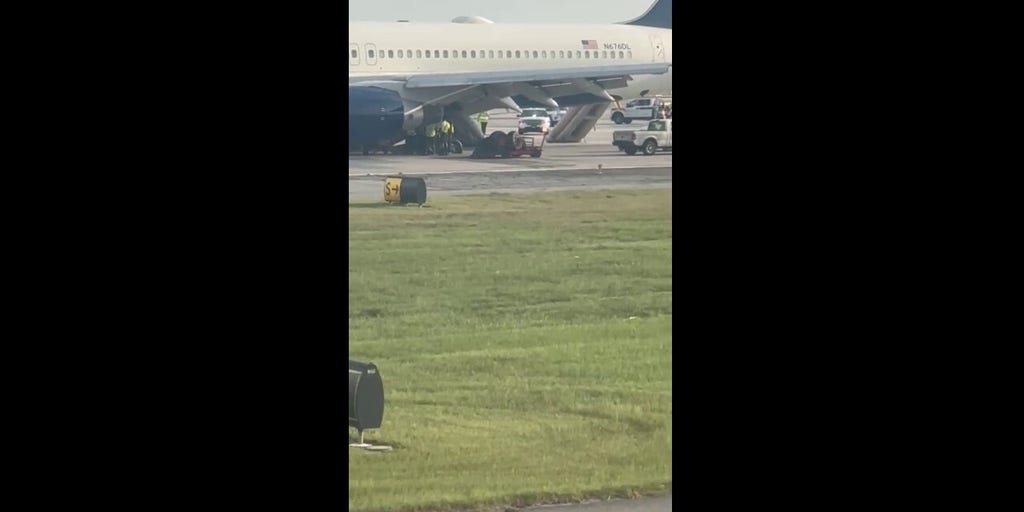 Delta Air Lines plane deploys emergency slides in Atlanta after tires ...