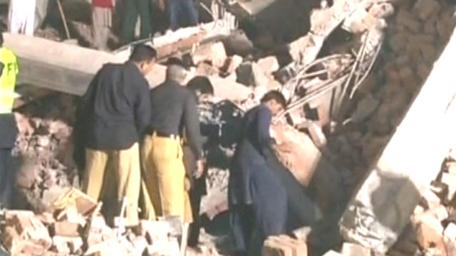 Rescuers search rubble for survivors of building collapse | Fox News Video