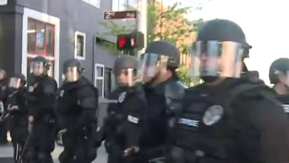 Five Seattle police officers hurt as May Day protest turns violent ...
