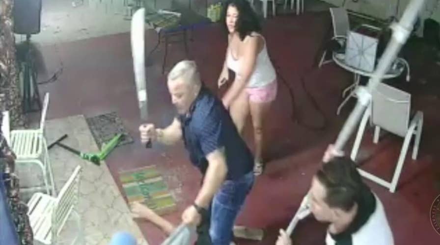 Watch Man Grabs Machete Chases Off Armed Robbers Fox News