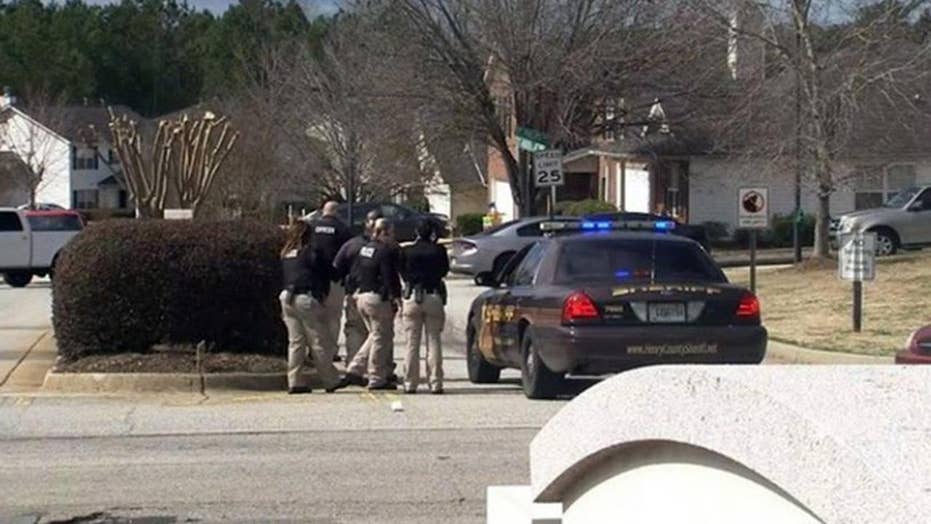 Georgia officer dies after being shot while serving warrant, police say ...