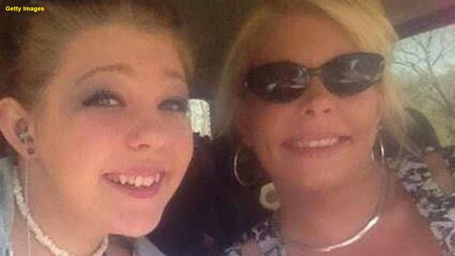 Woman shot herself in the head while cuffed with hands behind her back ...