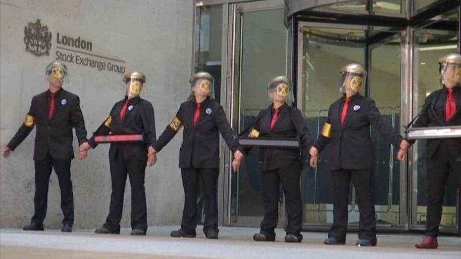 Climate activists glue themselves to London Stock Exchange on ‘last day ...