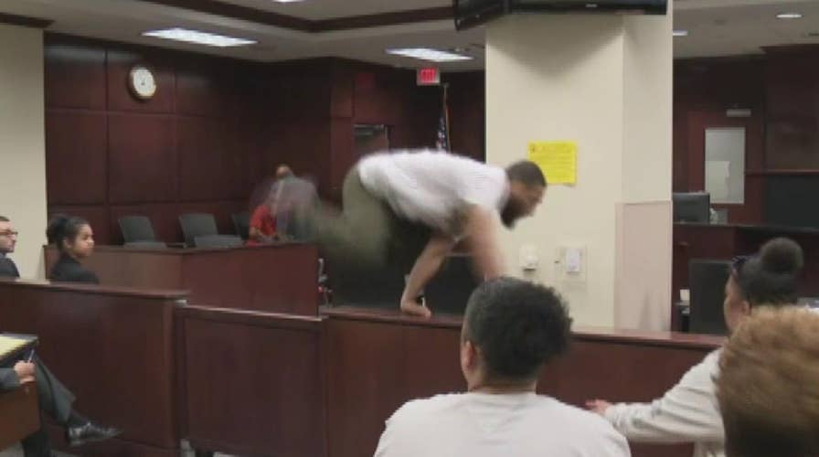 Son of murdered woman tries to attack suspected killer in Michigan ...