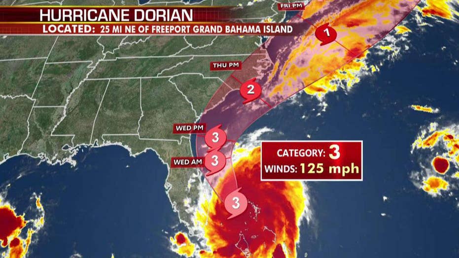 Hurricane Dorian downgraded to Category 3 storm, continues its assault ...