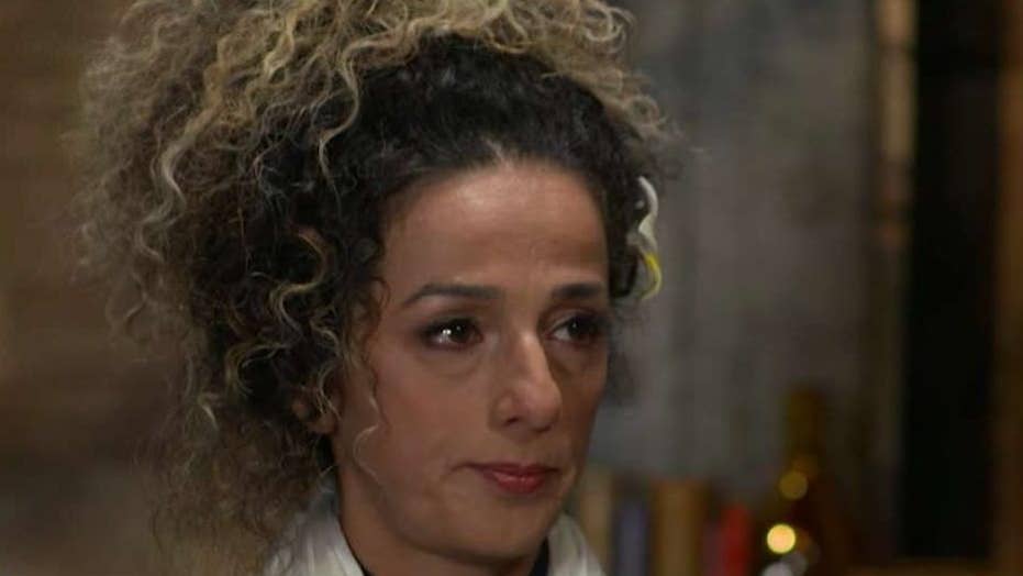 Political activist pushes back against Iranian leaders by taking off ... Political activist pushes back against Iranian leaders by taking off ...