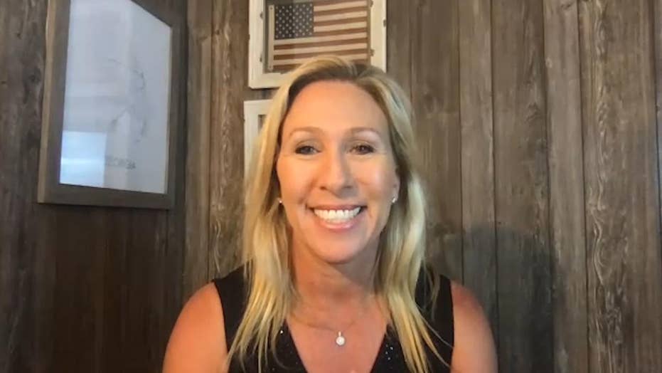 GOP candidate Marjorie Greene faces backlash over image of herself ... GOP candidate Marjorie Greene faces backlash over image of herself ...