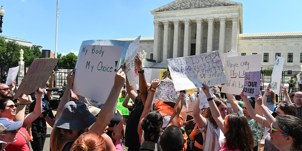 Protesters gather outside Supreme Court one day after reversal of Roe v ...