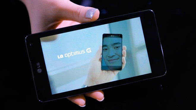LG Unveils New Premium Phone With Voice-Activated Power Camera | Fox ...