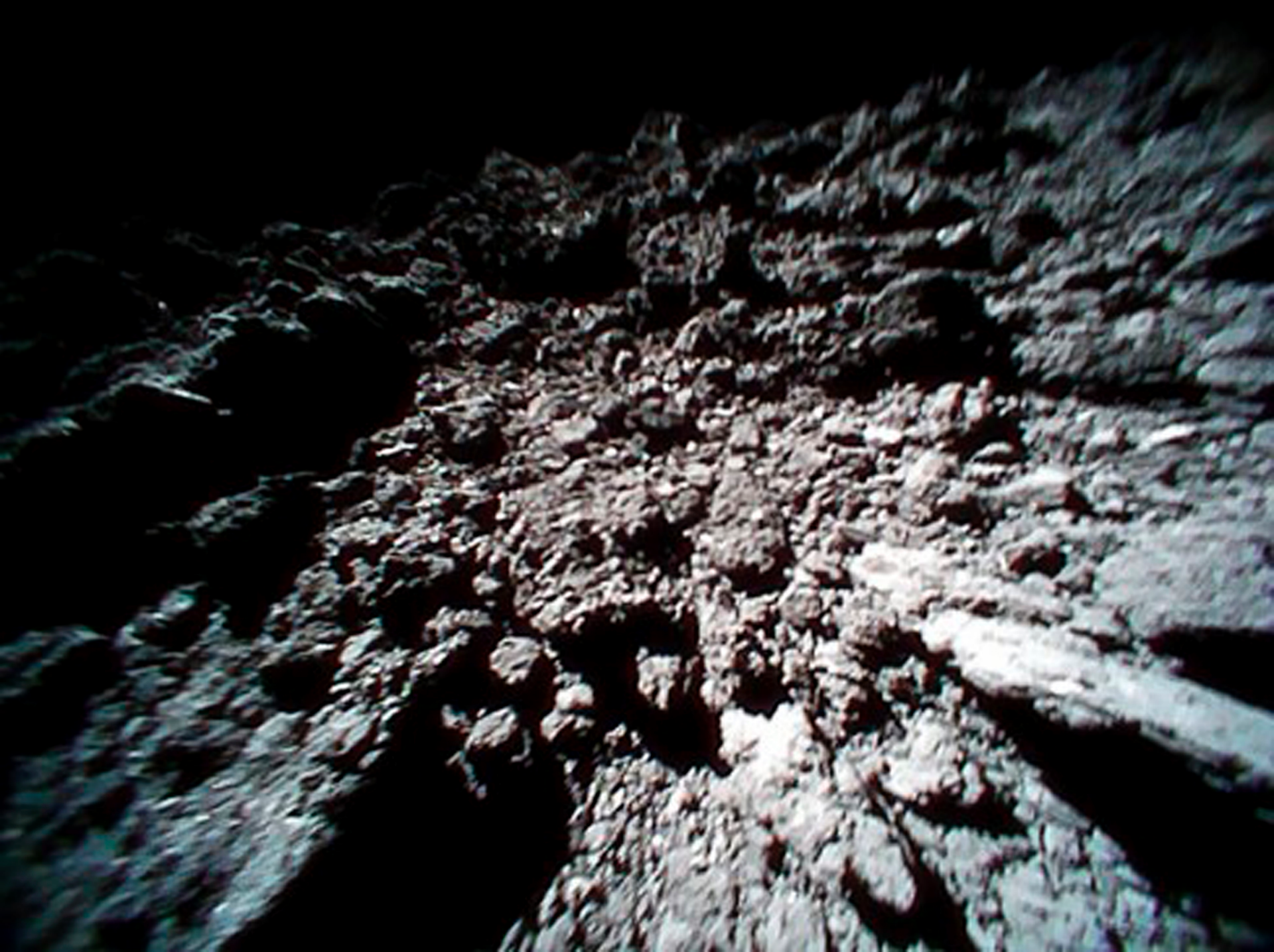 Photos from Japanese space rovers show asteroid is ... rocky | Fox Business