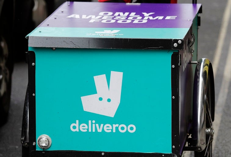 UK competition watchdog pauses Amazon's investment into Deliveroo food ...