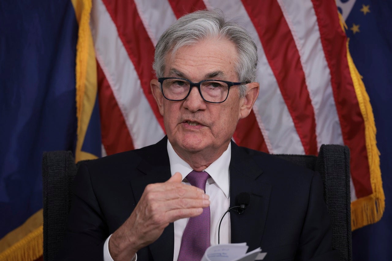 Powell signals Fed may take its foot off the gas on rate hikes ...
