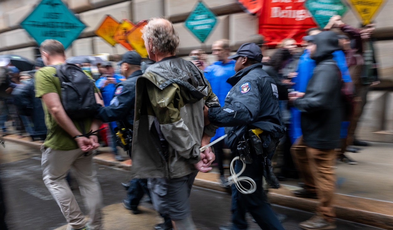 Multiple people arrested in NYC at climate change protest on Wall ...