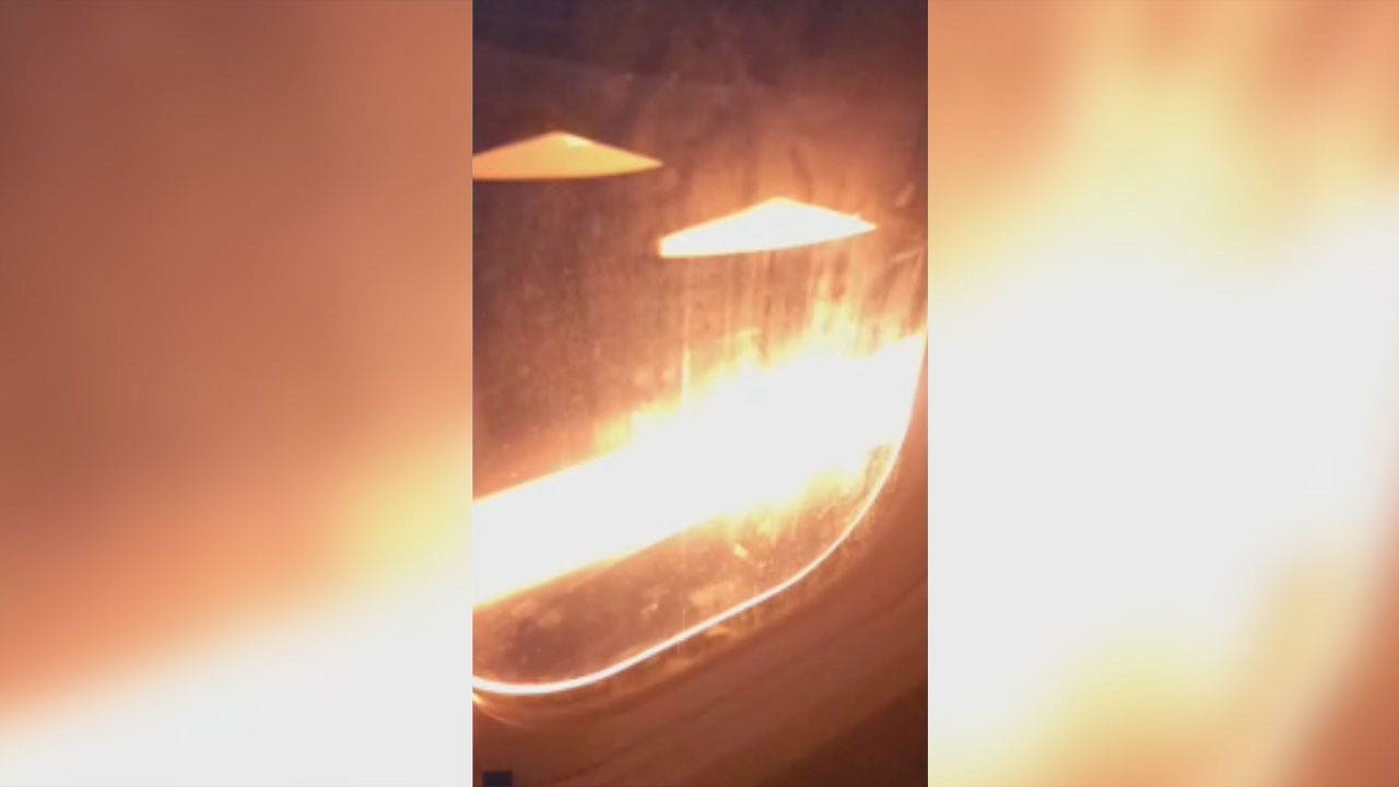Flames seen shooting from engine of United Airlines flight before ...