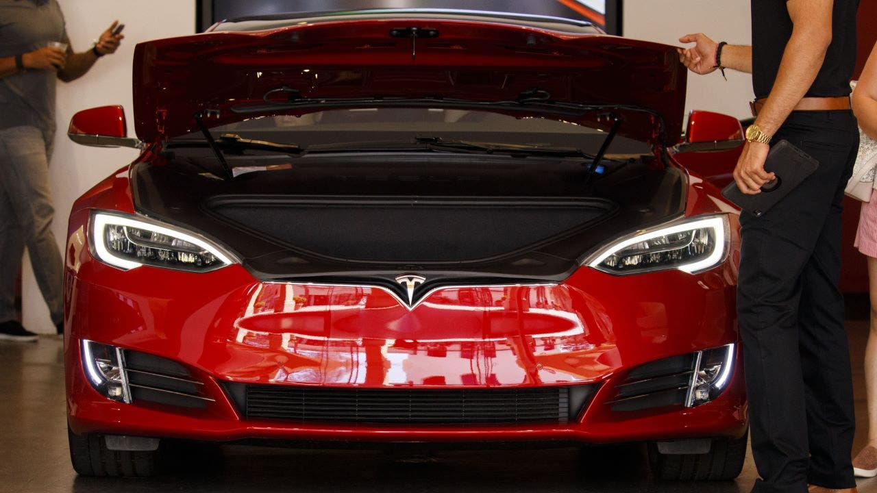 Tesla recalls 1.85 million vehicles over unlatched hood detection ...