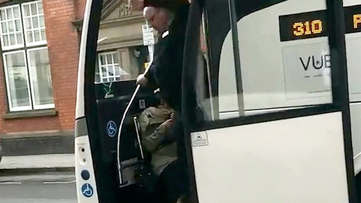 Bus driver tries dragging off passenger, angered by electronic ticket ...