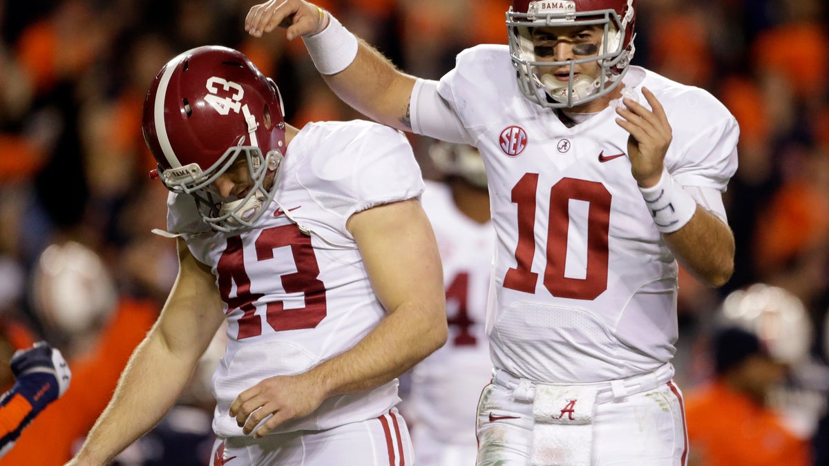 Alabama fans, teammates rally around kicker Cade Foster after Iron Bowl ...