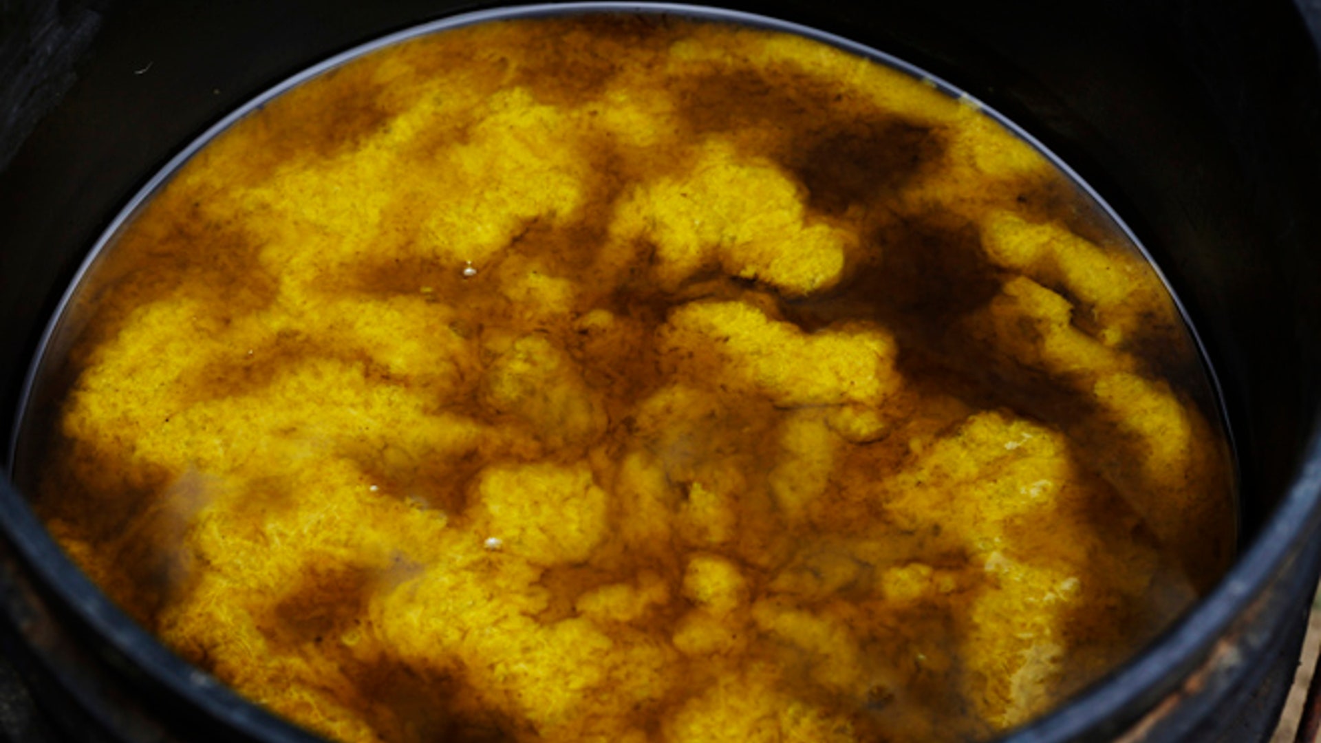 A look at coca paste production at small lab in mountains of Colombia ...