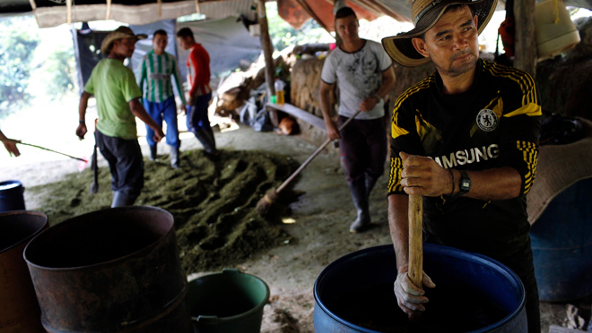 A look at coca paste production at small lab in mountains of Colombia ...