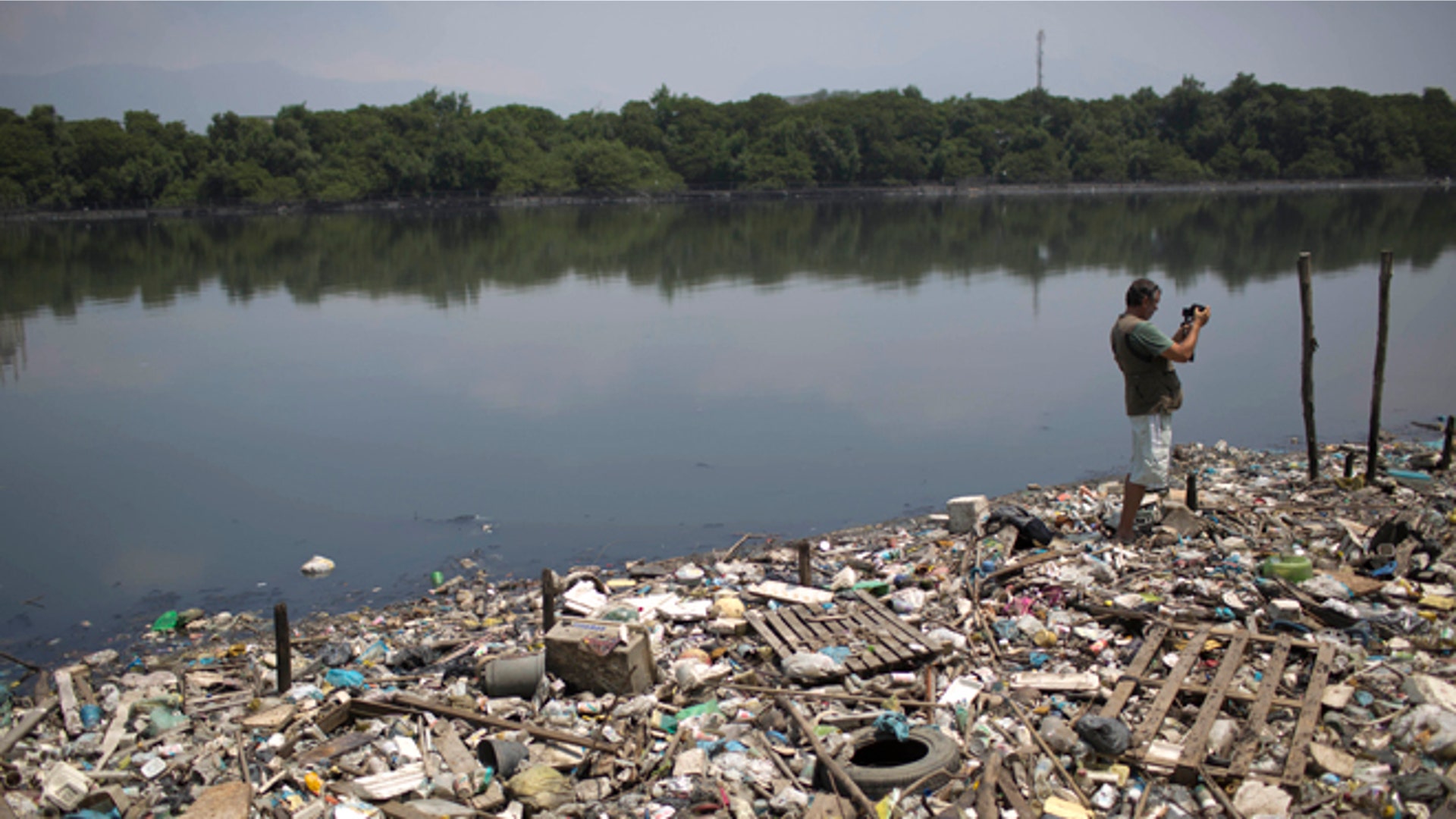Rio De Janeiro Struggles With Trash-Clogged Waterways Before Olympics ...